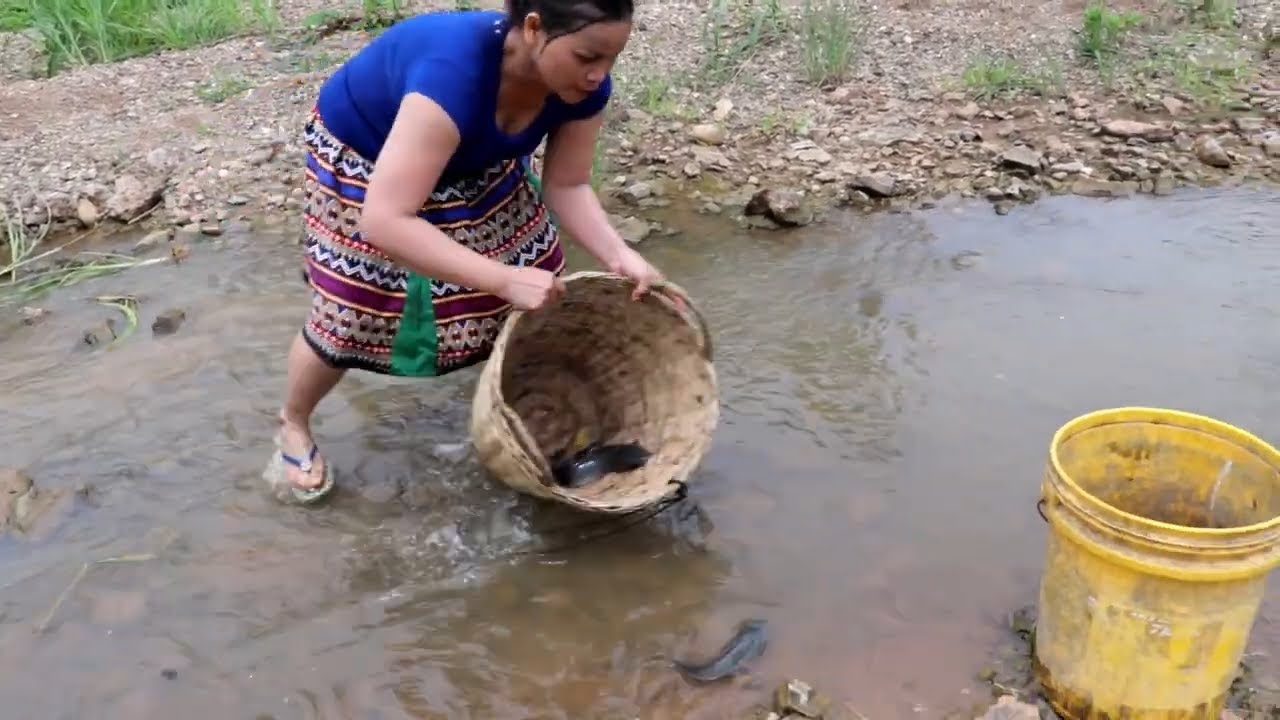 young woman fishing/Trap fishing-Woman catch fish in river - YouTube