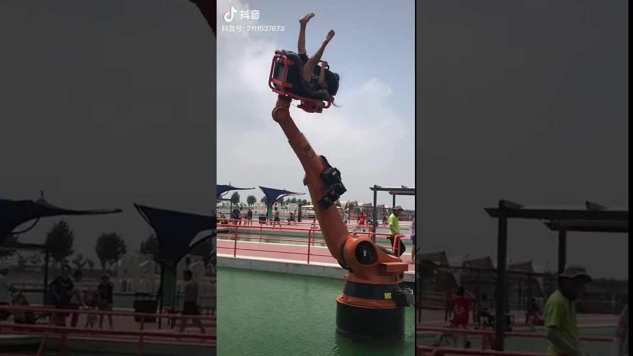 theme park robot arm ride - YouTube