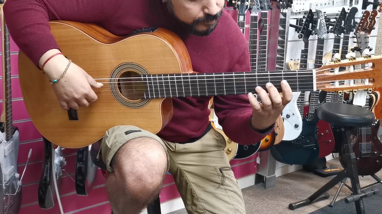 HS10CEQ Miguel Rosales Solid Top Electro-Classical Guitar - YouTube