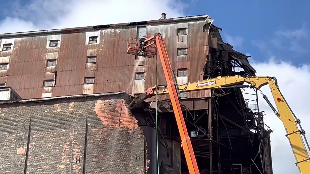 Taking down brick wall Great Northern elevator - YouTube