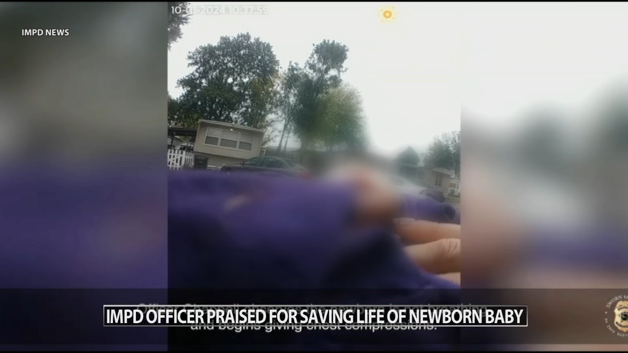 Indianapolis police officer saves baby's life - YouTube