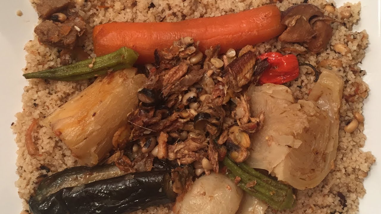 Thiébou Kéthiakh (riz au poisson séché) / Dried fish rice - YouTube