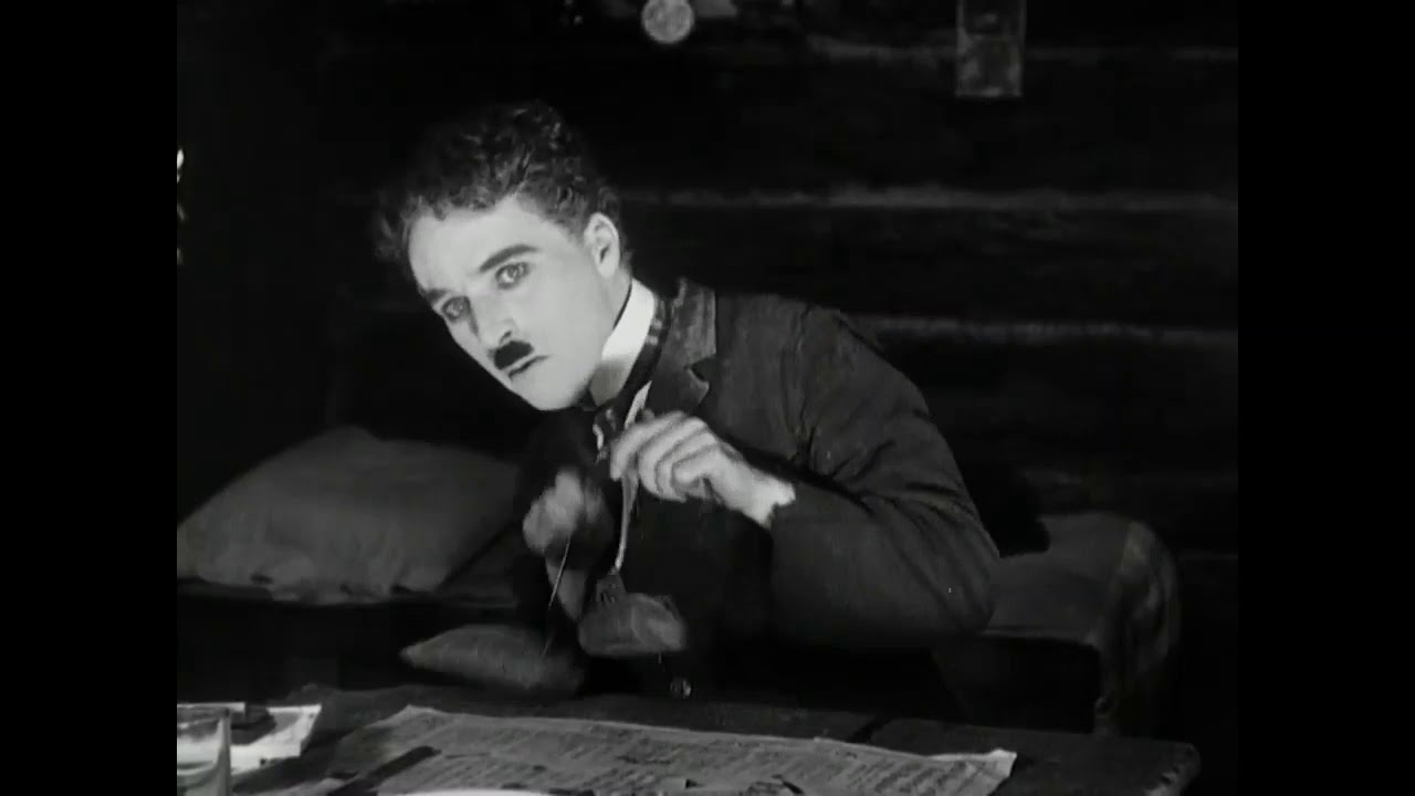 FUNNY Charlie Chaplin dancing with forks and bread - YouTube