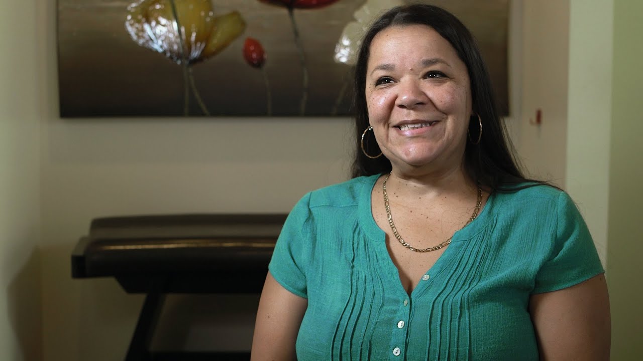 LaJuana C. on her life changing dental implant experience - YouTube