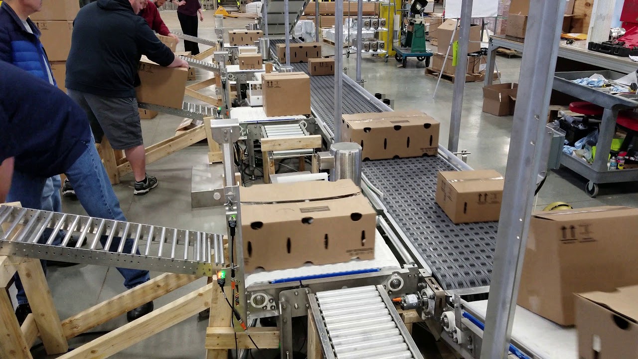 NCC - Intralox ARB 4:1 Right Angle Case Merge Shop Test - YouTube