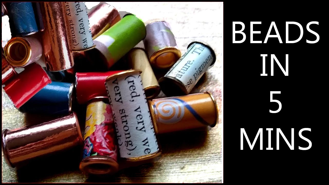 Handmade Beads using magazine paper scraps to embelish Journals etc ...