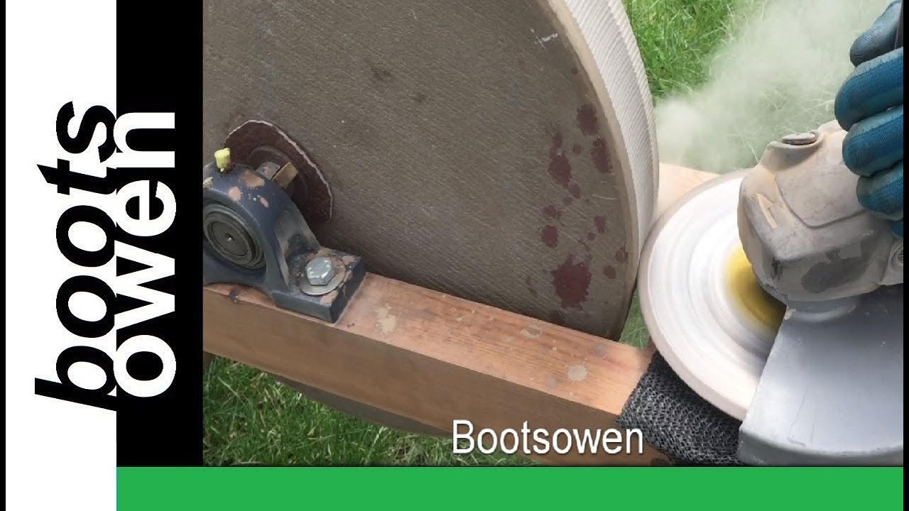 Facing and truing a large sandstone grindstone - YouTube