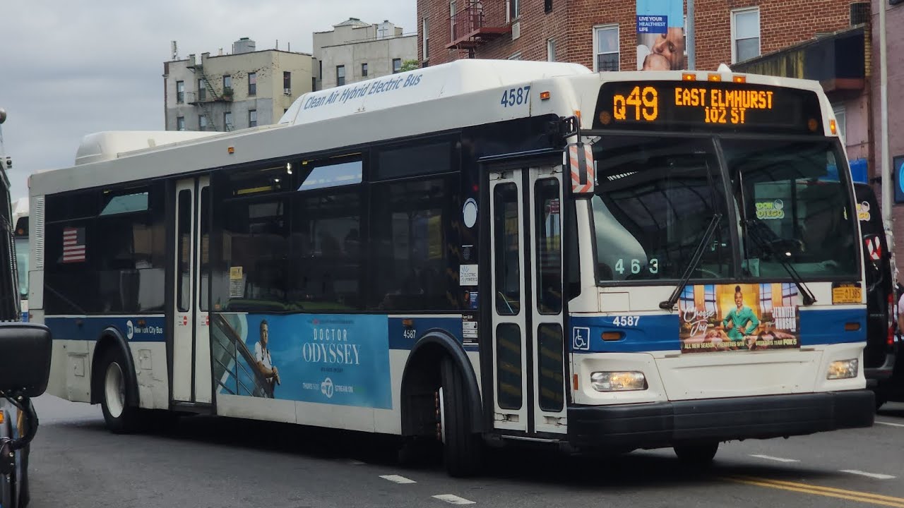 MTA Bus #4587 on the Q49 to East Elmhurst 102 St leaving the 74th St ...