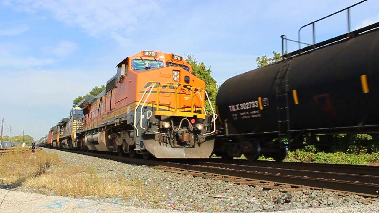 MEET: BNSF C40-8W and her Leslie RS3L head east with Crude Oil while a ...