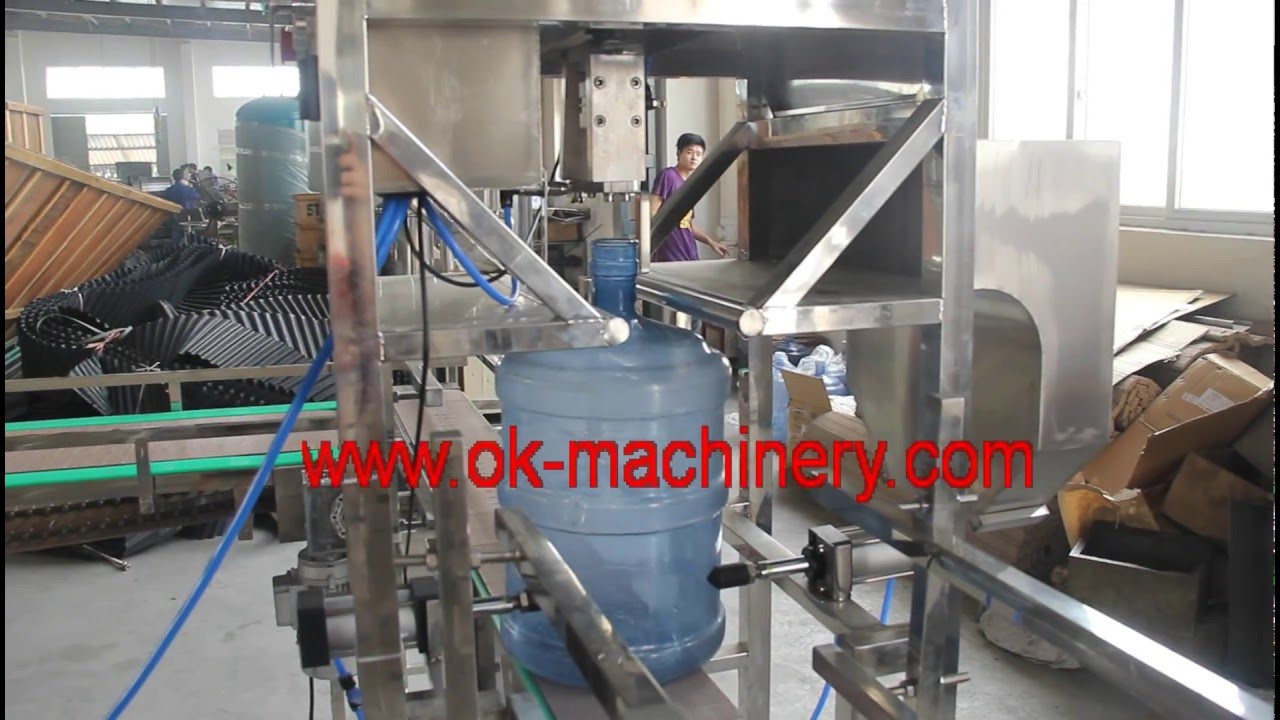 full-auto pull out lid machine(拔盖机) - YouTube