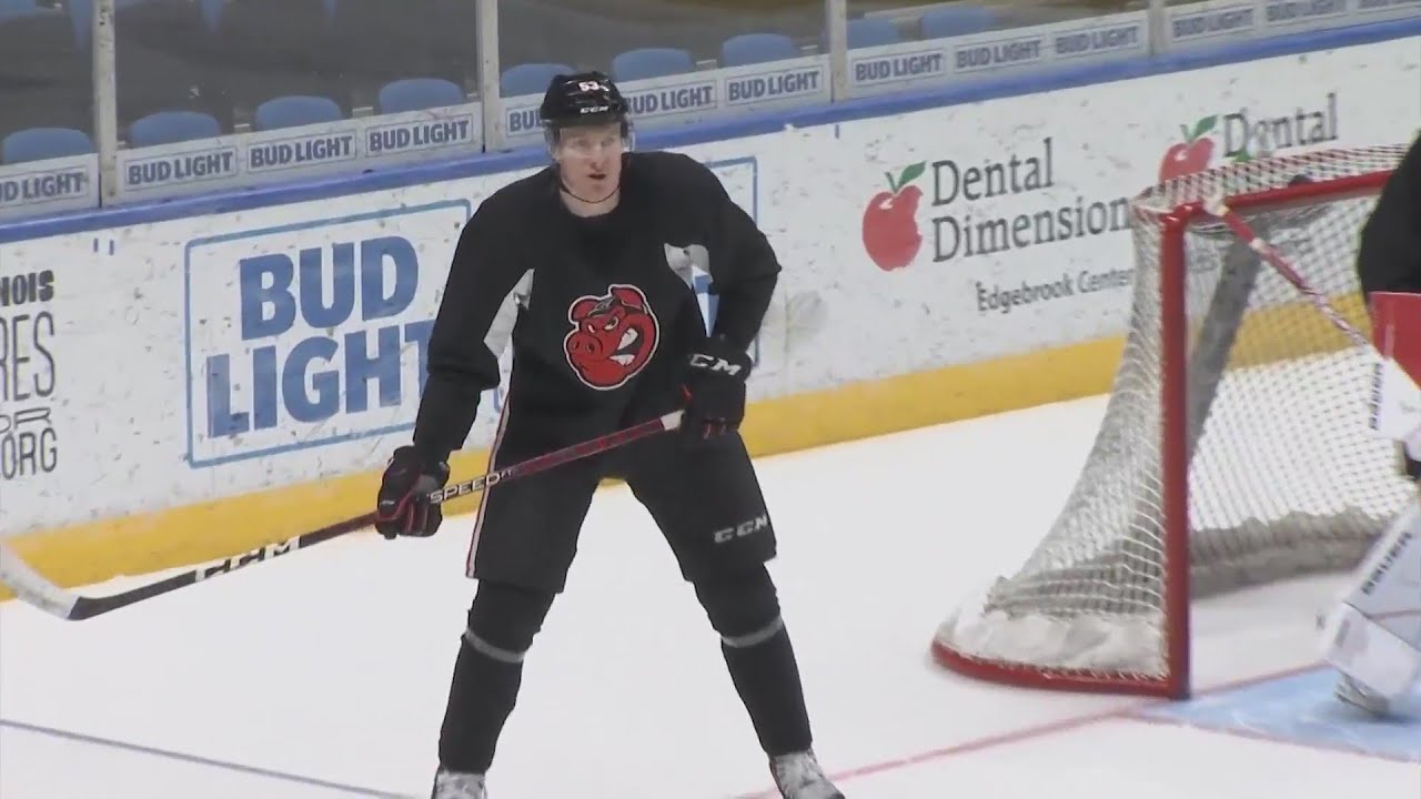 Buddy Robinson back from Chicago and ready to aid the IceHogs' playoff ...