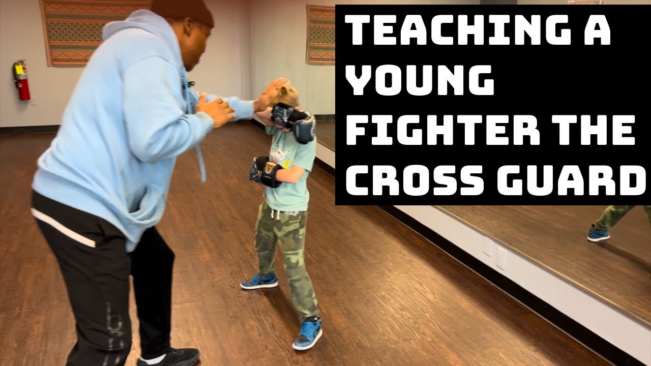 Teaching a Young Boxer the Cross Guard - YouTube