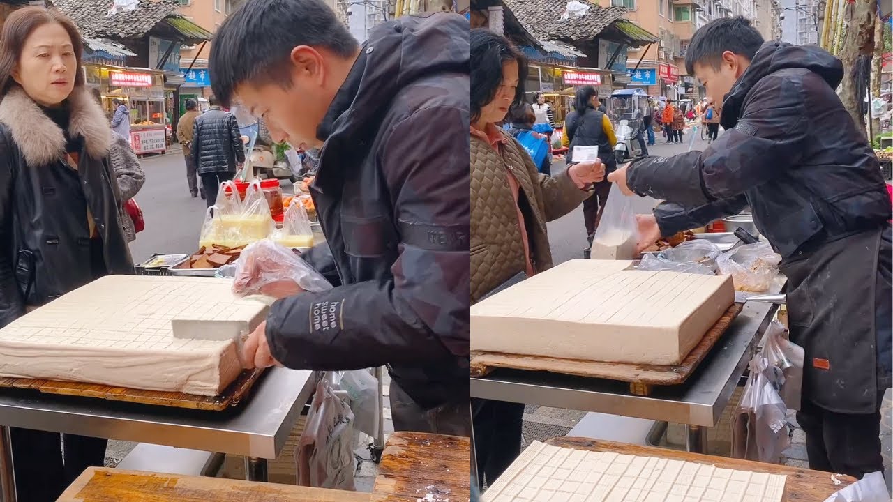 The stall sells tofu, which is freshly made and sold on November 10st ...