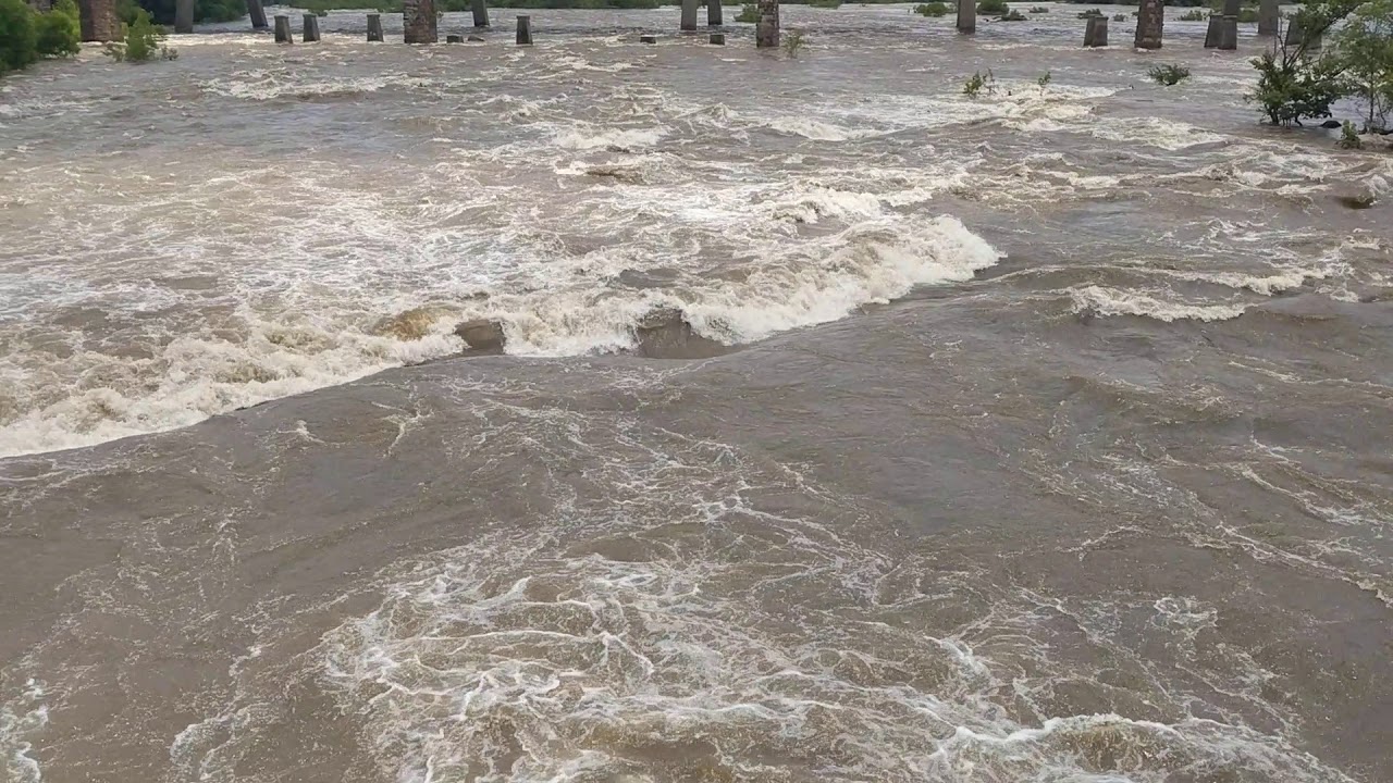 High water on the Falls of the James - YouTube