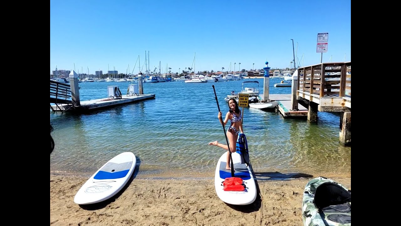 Stand up paddle boarding at the Grand Canal in Balboa Island Newport ...