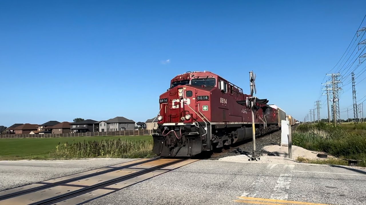 CPKC train 135 crawling through Belle River - YouTube