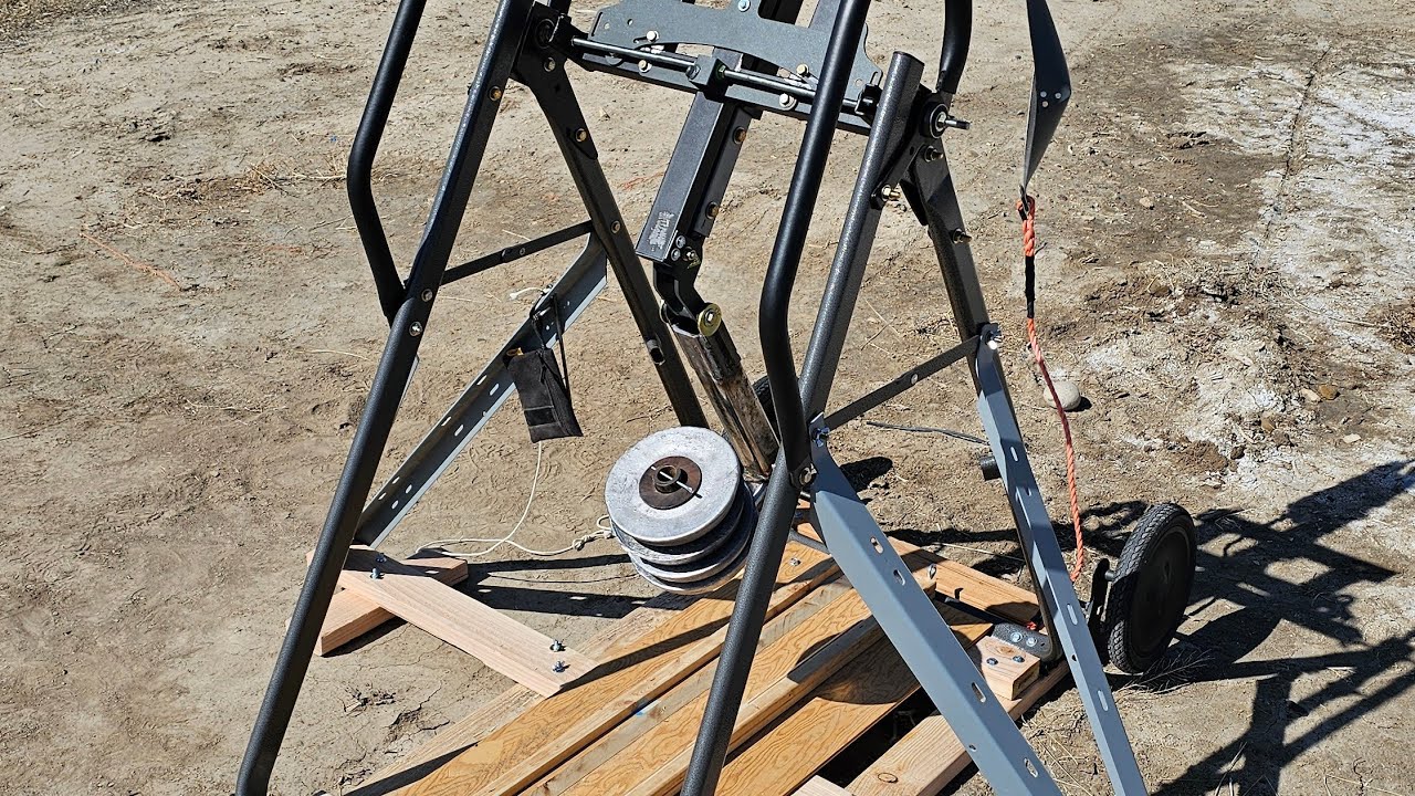 homemade trebuchet- repurposed from inversion table - YouTube