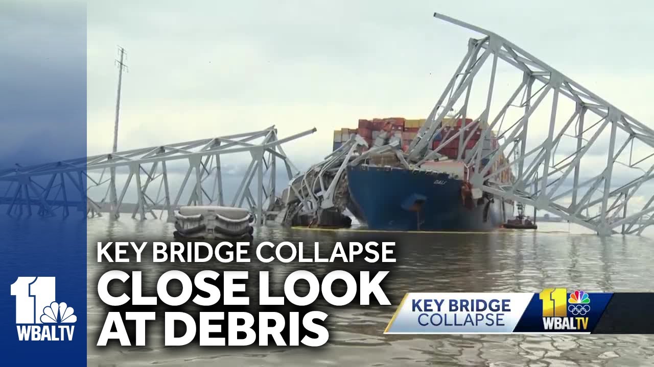 Crews clear bridge debris in crucial undertaking - YouTube