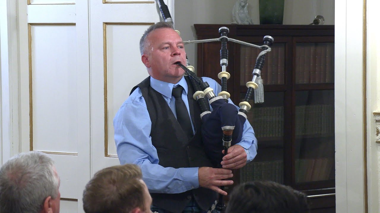 Champion piper Stuart Liddell playing a March, Strathspey & Reel set at ...