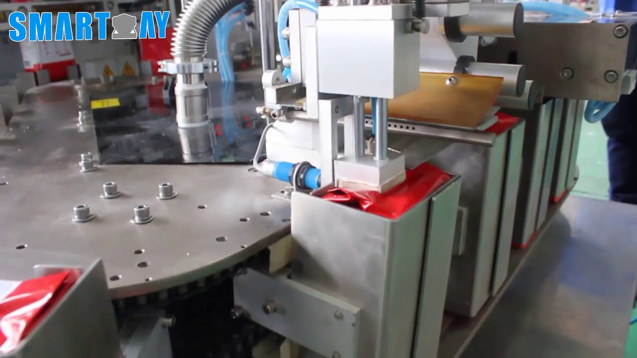 Brick vacuum packaging machine - YouTube