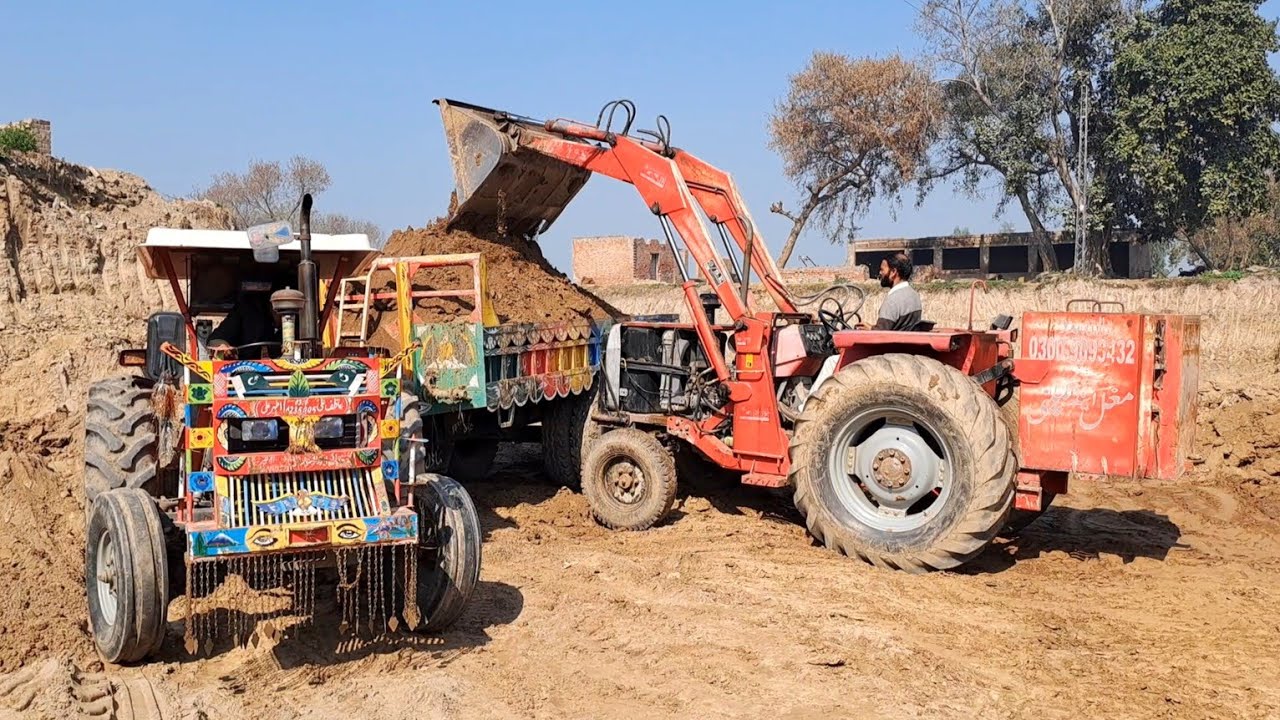 Jcb Caterpillar red Loader Loading Mud in Tractor 🚜 with Trolly - YouTube