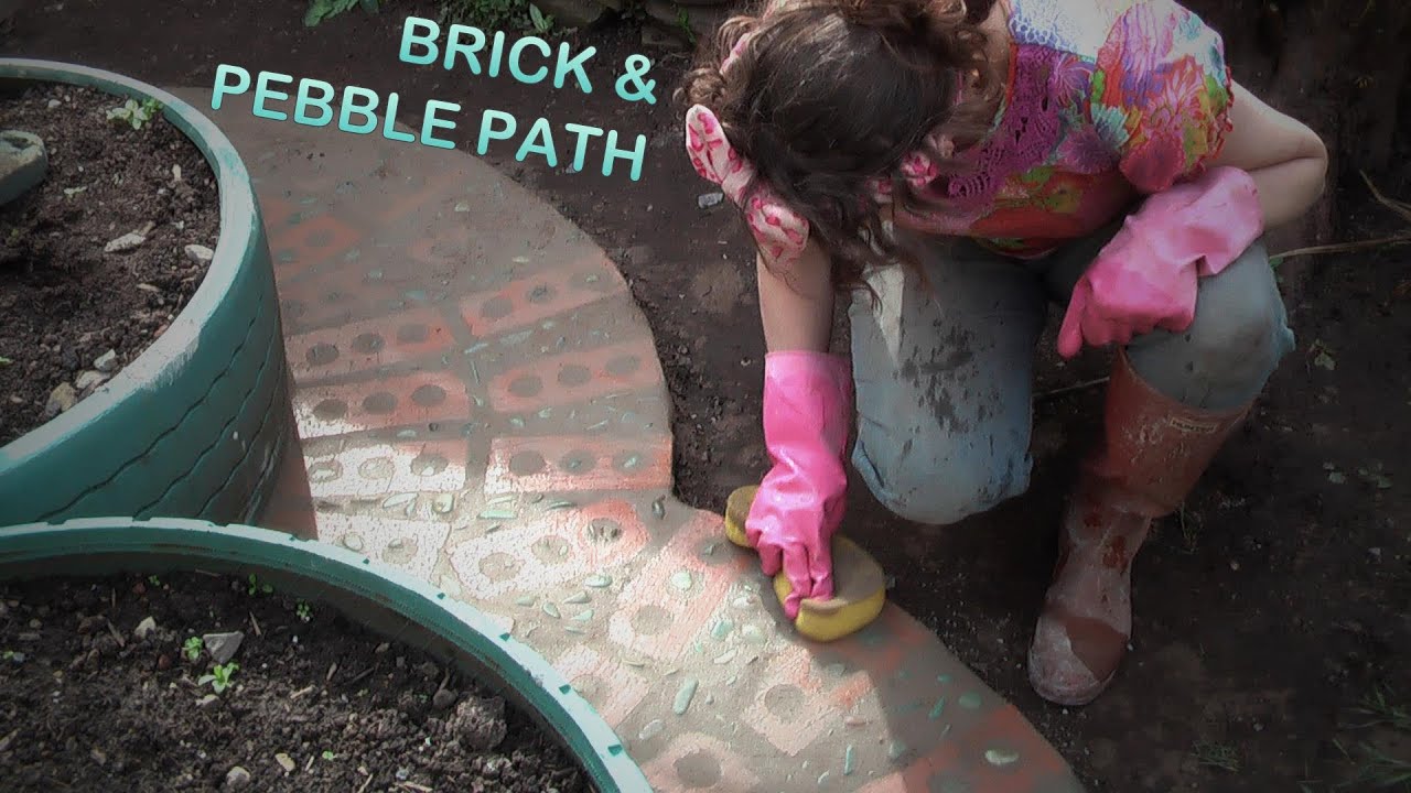 DIY Brick & Pebble Garden Path Around Tyre Planters - YouTube