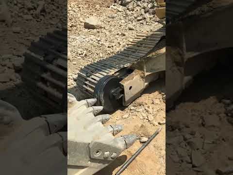 Replace excavator front idler