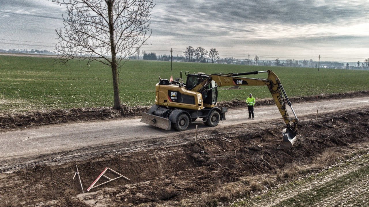 Cat M317F tiltrotator Engcon podwozenie palet, porządki i wyjazd z ...