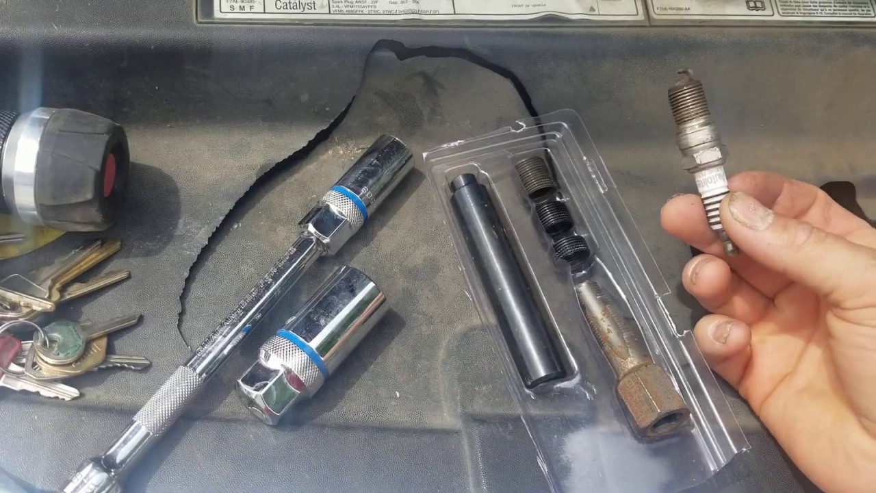 Fix striped spark plug hole - YouTube