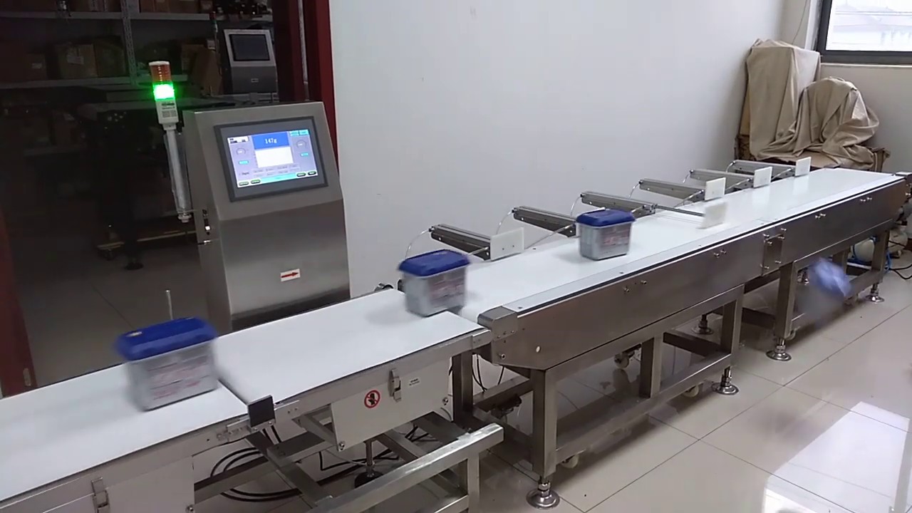 Weight grading sorting checkweigher machine - YouTube