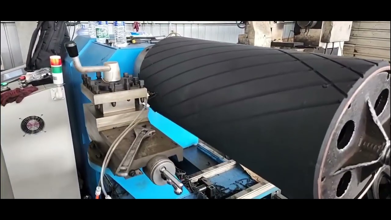 Rubber roller grooving machine - YouTube