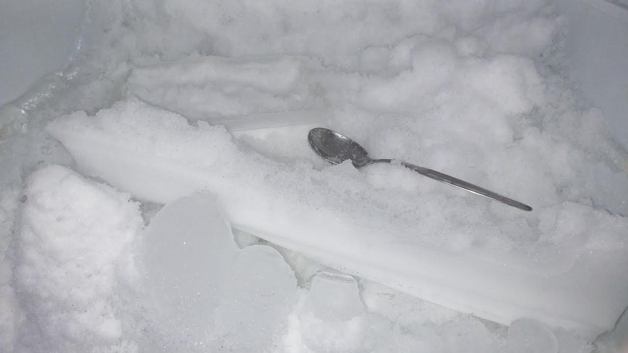 Huge defrosted freezer frost scraping freezer frost eating - YouTube