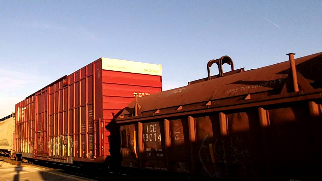 CP 245 w/ CP 8708 & SOO 6029 lead this long WB mixed freight/Autorack ...