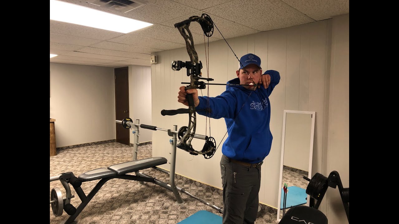 Shooting my PSE FEROCITY bow in the house! - YouTube