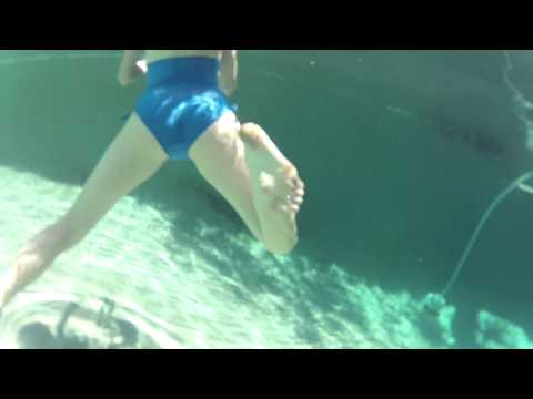 Rilee Marks swims around in her blue swimsuit 2013 not 1971