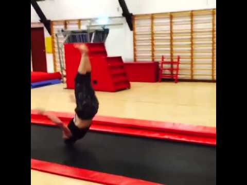Guy Performs Handstands and Flips on a Trampoline - YouTube