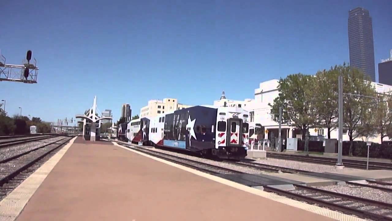 TRE and a DART Train at the Dallas Texas Amtrak station - YouTube