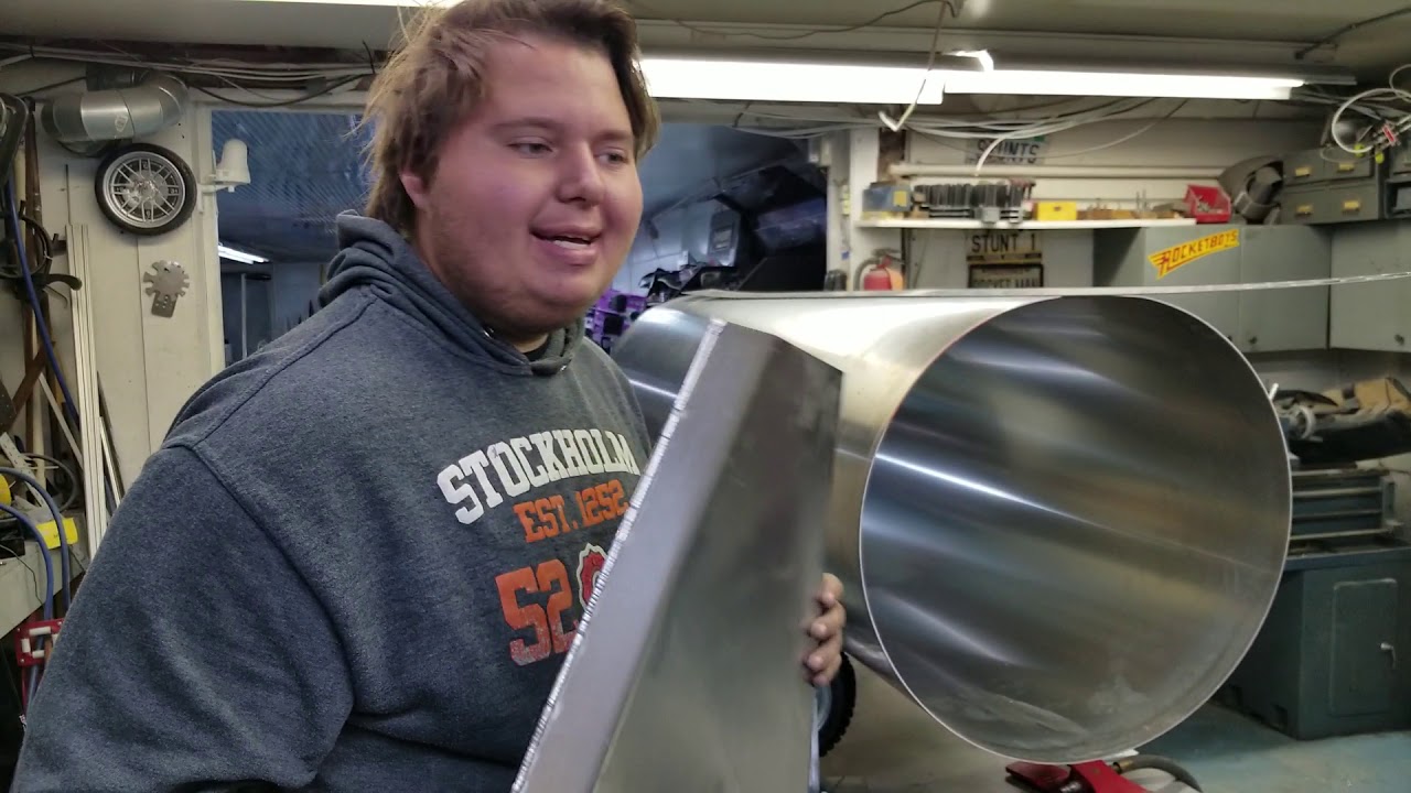 Drilling and popping rivets on our 36ft Tall Aluminum Rocket - YouTube