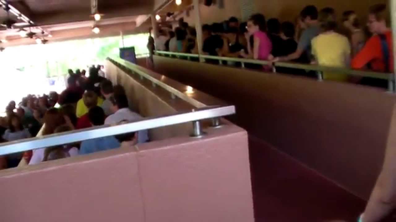 Waiting in line for the Rock 'n' Roller Coaster, everybody sings along ...