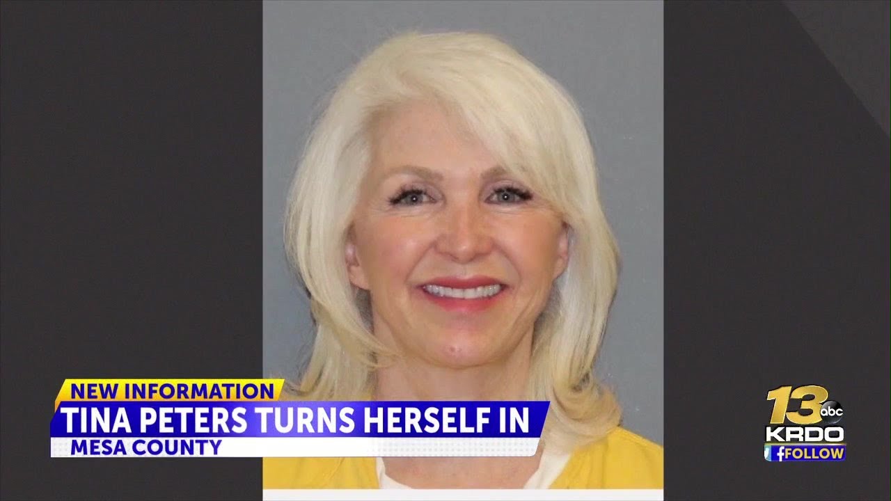 Tina Peters turns herself in after second arrest warrant issued - YouTube
