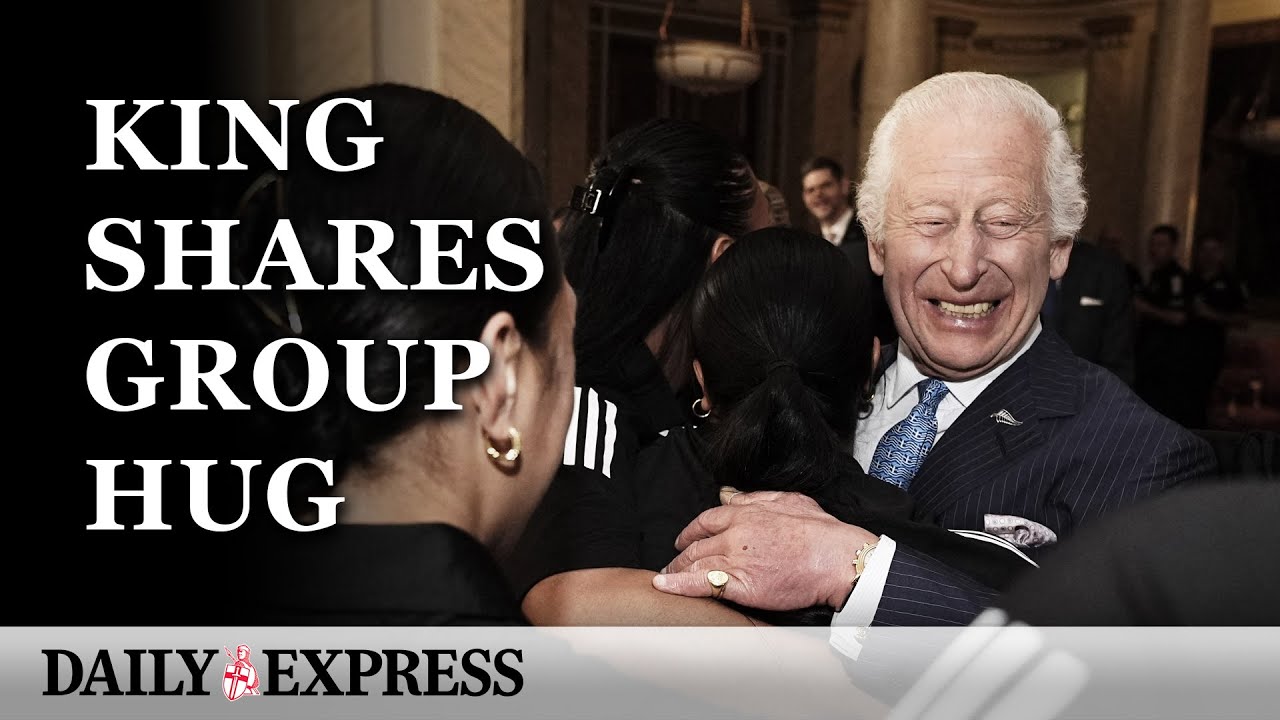 Heartwarming moment King embraces New Zealand group hug - YouTube