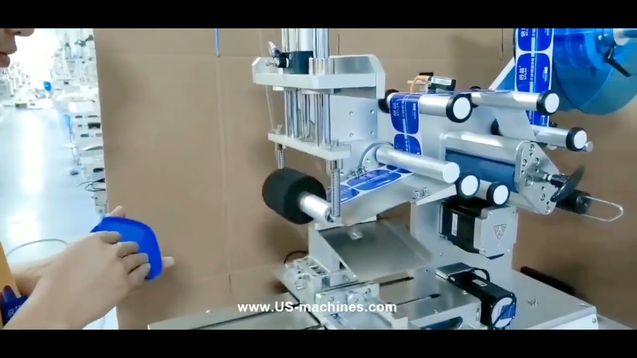Semi automatic cover lid labeling machine - YouTube