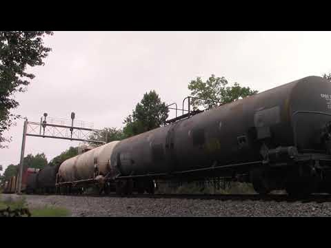 UP 8108 and UP 7999 lead an eastbound mixed freight train out of the siding at CP Ardrey. - YouTube