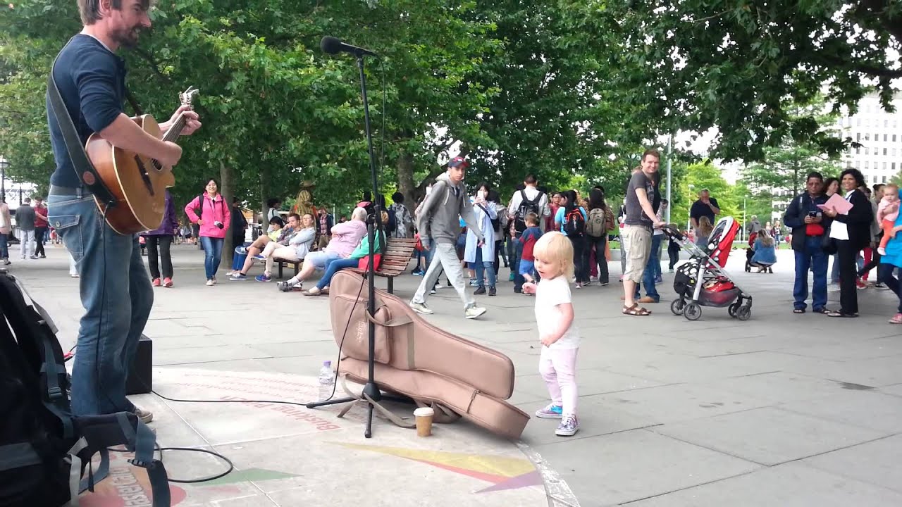 Toddler dancing to street performer - YouTube