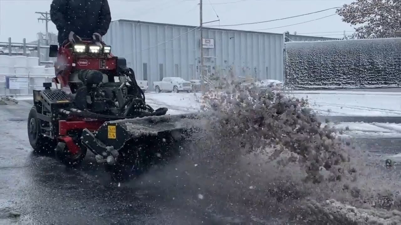 The Toro Grandstand Multi Force in action | Sweeper Attachment in ...