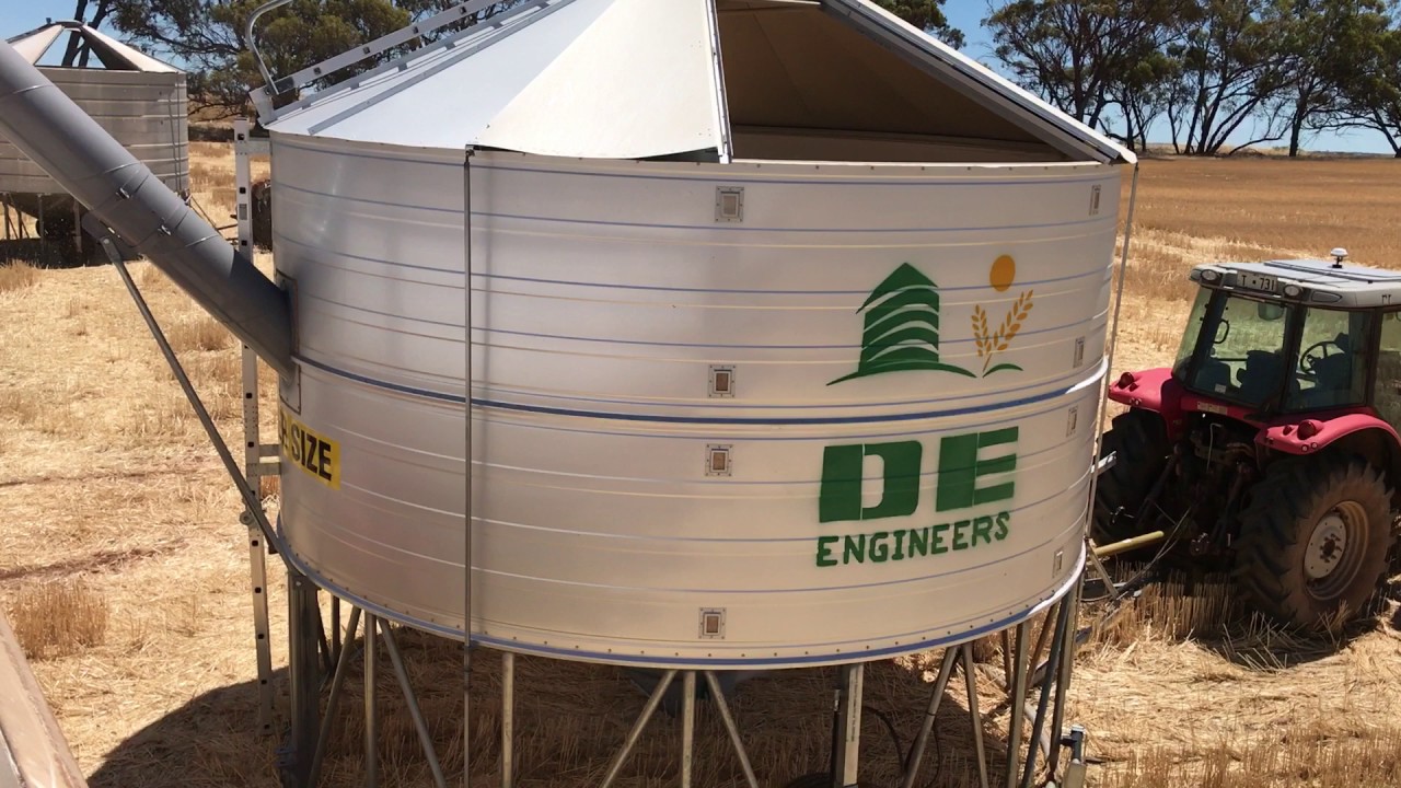 Pop unloading from field bin into truck - YouTube