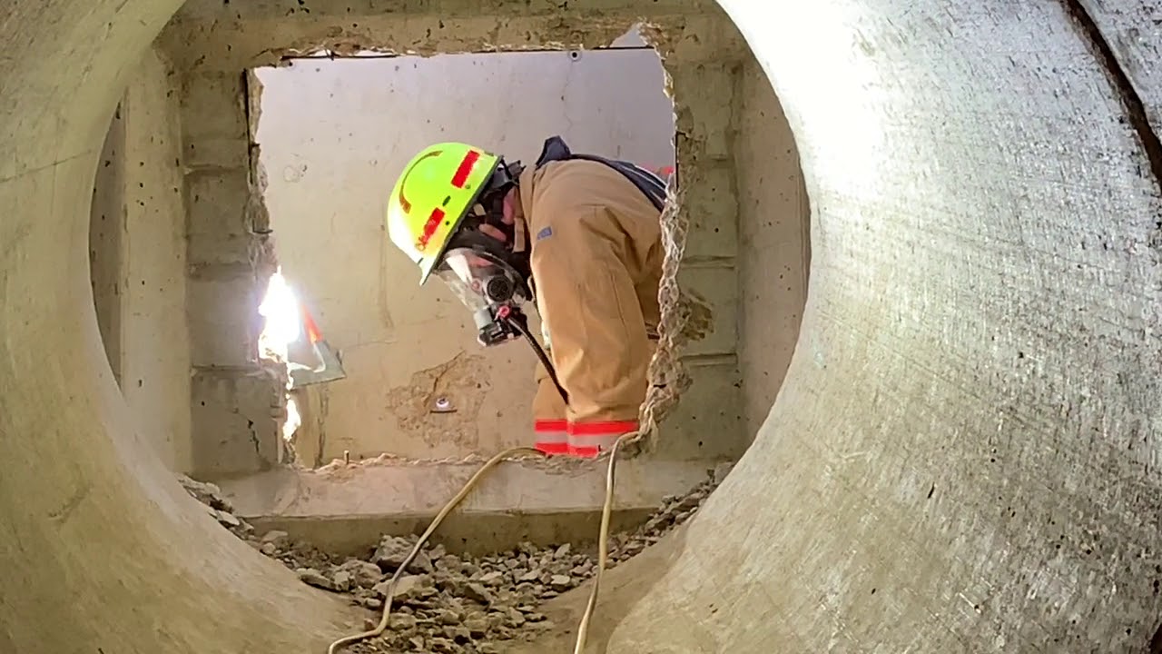 Technical Rescue Team Training: Tunneling Through A Simulated Building ...