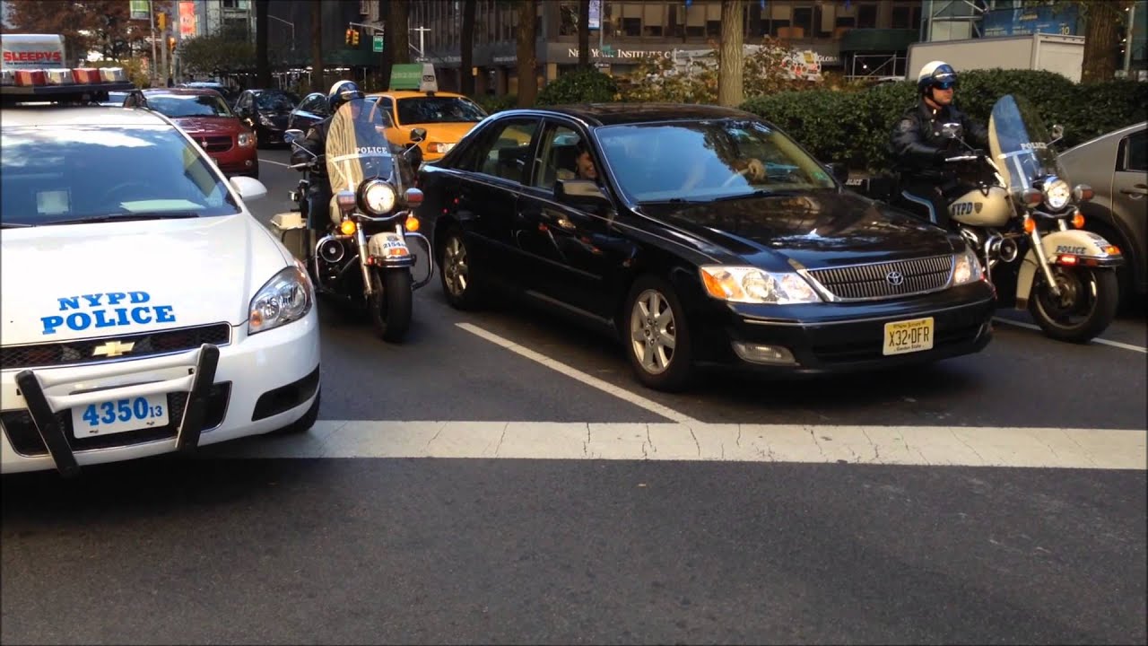 2 NYPD HIGHWAY PATROL MOTORCYCLE UNITS ON W. 62ND ST. ON WEST SIDE OF ...