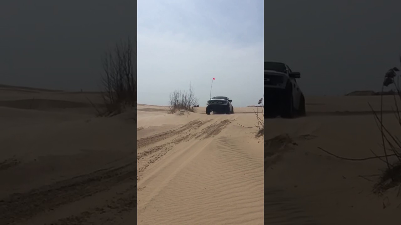 Ford raptor jump at silver lake sand dunes - YouTube