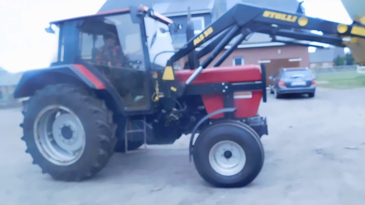 Case-IH 844 XLN Ballen laden - YouTube